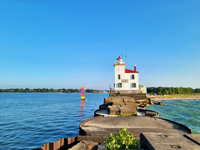 "Ahoy, lighthouse lovers! This 42-foot beacon of beauty stands tall, guarding Lake Erie like a maritime superhero in a crisp white cape."
