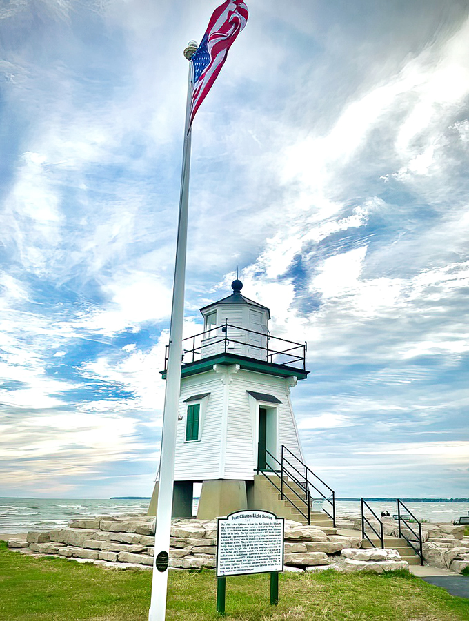 Beacon of beauty! This charming lighthouse stands tall against the sky, like a maritime supermodel ready for its close-up.