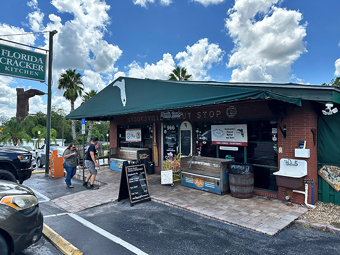 Welcome to flavor town! Florida Cracker Kitchen's charming exterior promises a down-home feast that'll make your taste buds do the happy dance.