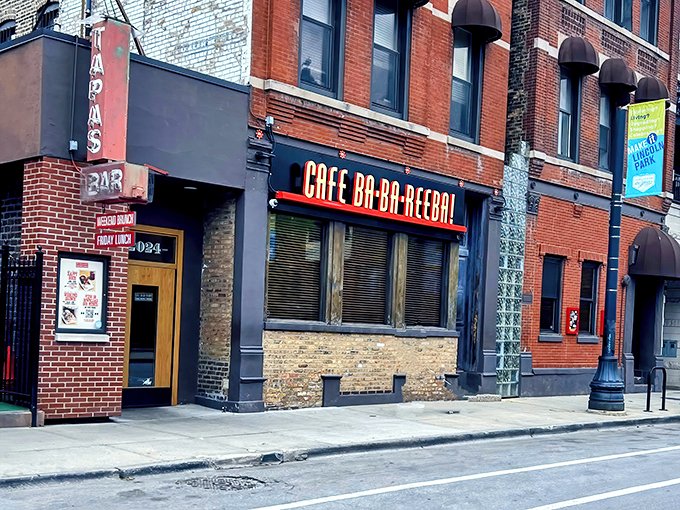 A neon sign that screams "fiesta" louder than a mariachi band! Cafe Ba-Ba-Reeba's exterior promises a taste of Spain in the heart of Chicago.