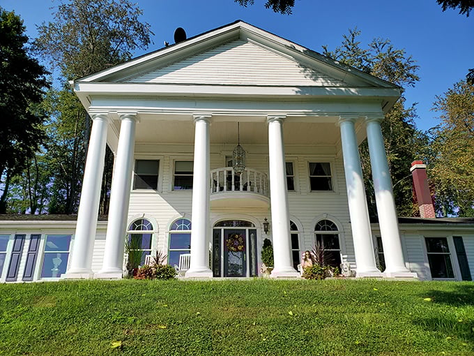 A grand entrance fit for a Jane Austen novel! This Georgian-style facade whispers tales of elegance and afternoon teas.