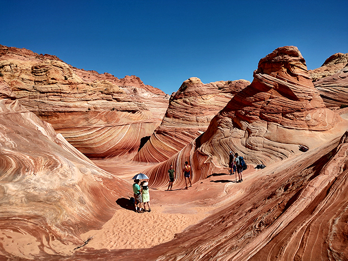 Nature's own roller coaster! The Wave's undulating sandstone formations look like they were sculpted by a giant with a sweet tooth for geological eye candy.