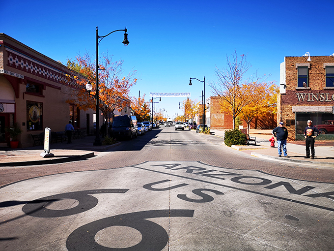 "Well, I'll be a son of a gun!" This corner in Winslow, Arizona, is where Eagles fans' dreams come true. It's like stepping into a life-sized album cover!