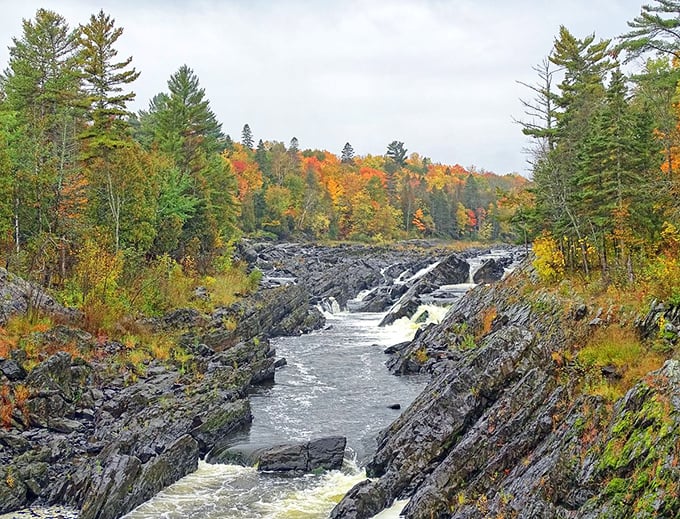 Nature's grand design meets human ingenuity! The Swinging Bridge at Jay Cooke State Park is like a real-life Indiana Jones set, minus the boulder chases.