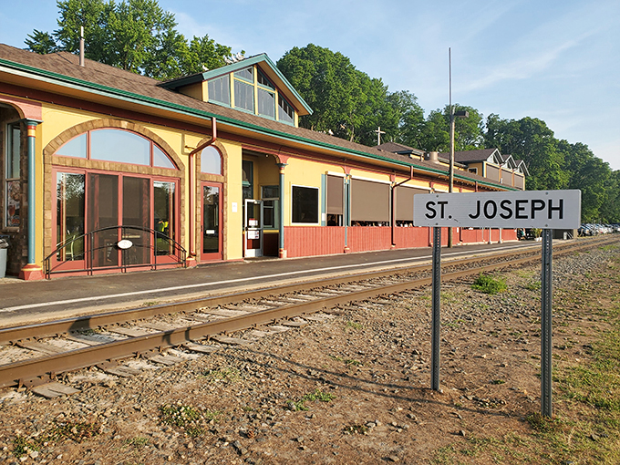 All aboard the flavor express! This sunny yellow station isn't just a relic—it's your ticket to pizza paradise.