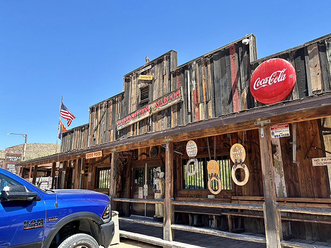 Step back in time! This weathered wooden facade isn't a movie set - it's the real deal, serving up nostalgia with a side of chili burgers.