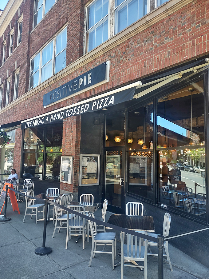 Brick and mortar never looked so inviting! Positive Pie's storefront promises hand-tossed pizza and live music &ndash; a feast for all senses.