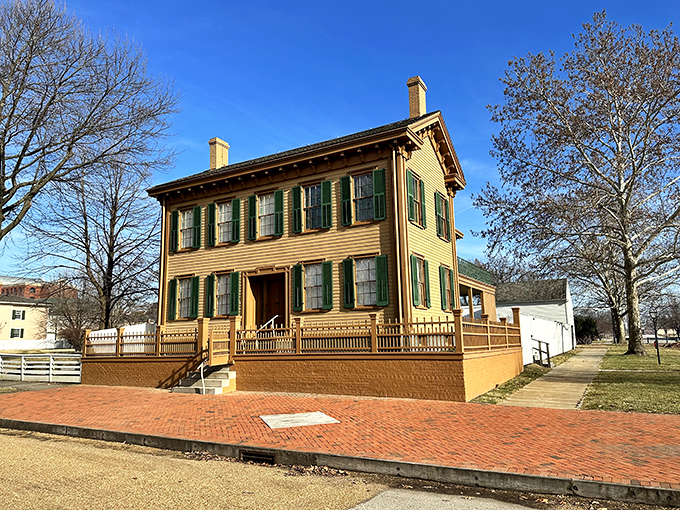 Honey, I shrunk the White House! Lincoln's humble abode stands proud, a yellow beacon of history nestled among Springfield's trees.
