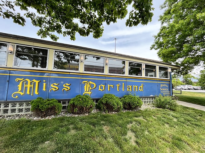 All aboard the flavor express! Miss Portland Diner's vibrant blue exterior promises a journey through time and taste buds.