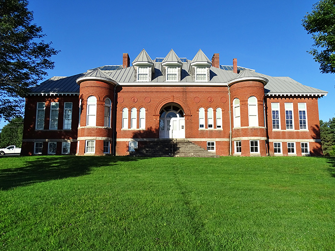 A brick beauty that's part Hogwarts, part time machine. This isn't your average school building &ndash; it's a portal to Maine's wild past!