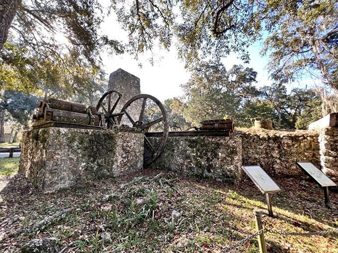 Time-worn stones whisper tales of sweetness past. This rustic ruin, nature's playground now, stands as Florida's own Stonehenge of sugar.