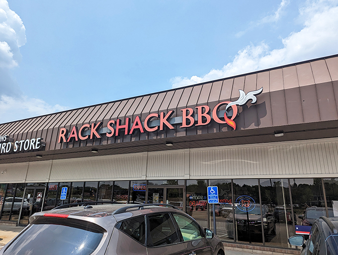 Welcome to flavor town! Rack Shack BBQ's unassuming exterior hides a world of smoky delights. It's like finding a treasure chest in a strip mall. 