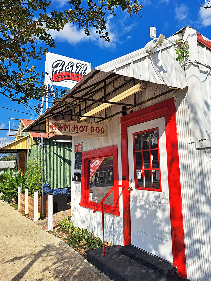 Step right up to hot dog heaven! This charming white shack with its bold red trim is like a beacon for hungry souls in Defuniak Springs.