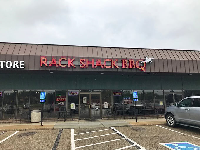 Welcome to flavor town! Rack Shack BBQ's unassuming exterior hides a world of smoky delights. It's like finding a treasure chest in a strip mall.
