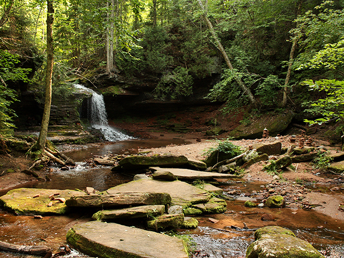 Nature's own watercolor masterpiece! Lost Creek Falls cascades down moss-covered rocks, creating a scene so picturesque it puts Bob Ross to shame.