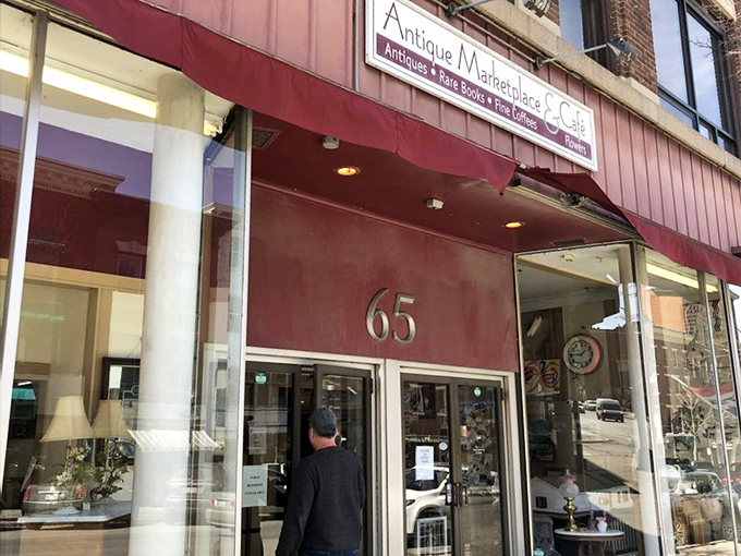 Step right up to the time machine! This burgundy-awninged wonder isn't just a store; it's a portal to the past that'll make you question your smartphone addiction.