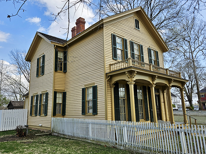 Honey, I shrunk the White House! Lincoln's humble abode stands proud, a yellow beacon of history nestled among Springfield's trees.