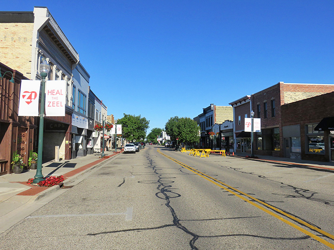 Autumn's paintbrush has gone wild in Zeeland! The "Feel the Zeel" banners aren't lying &ndash; this charming streetscape is giving me all the small-town feels.