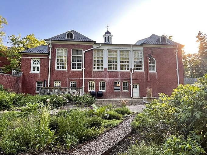 "Who needs Downton Abbey? This red-brick beauty is ready for its close-up, complete with a garden path that's begging for a dramatic entrance."