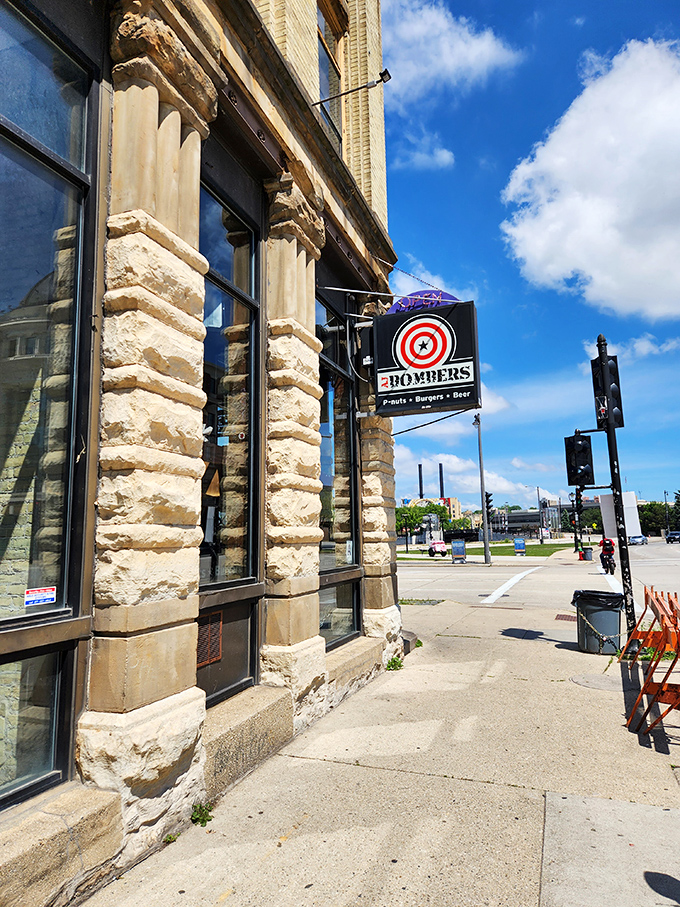 A beacon of burger bliss! AJ Bombers' vintage-inspired exterior promises a culinary adventure that's anything but ordinary.