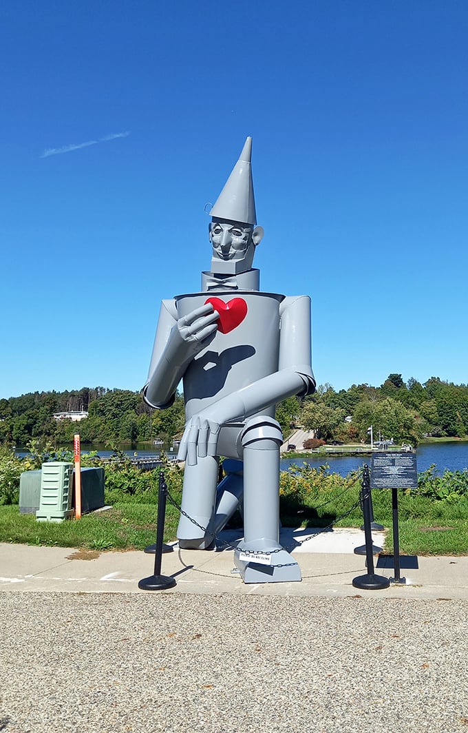 Tin Man's got heart! This towering silver sentinel stands guard over Hart Lake, a whimsical welcome to Michigan's quirkiest town.