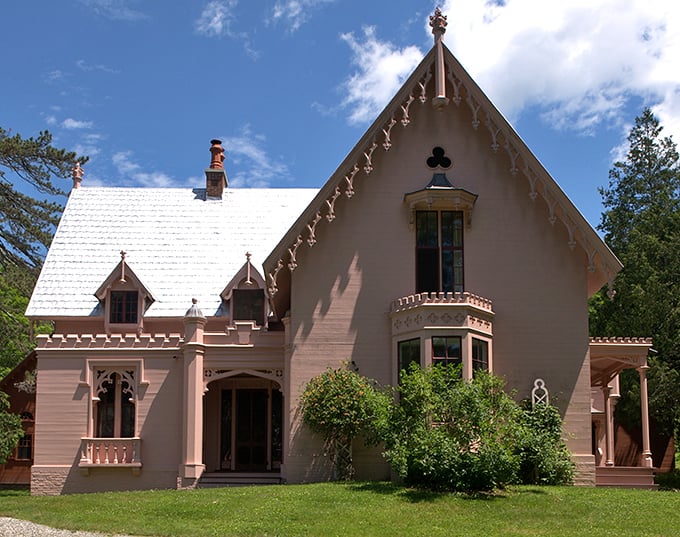Pink isn't just for Barbie's dreamhouse! This Gothic Revival mansion proves even historic homes can rock a bold hue with style.