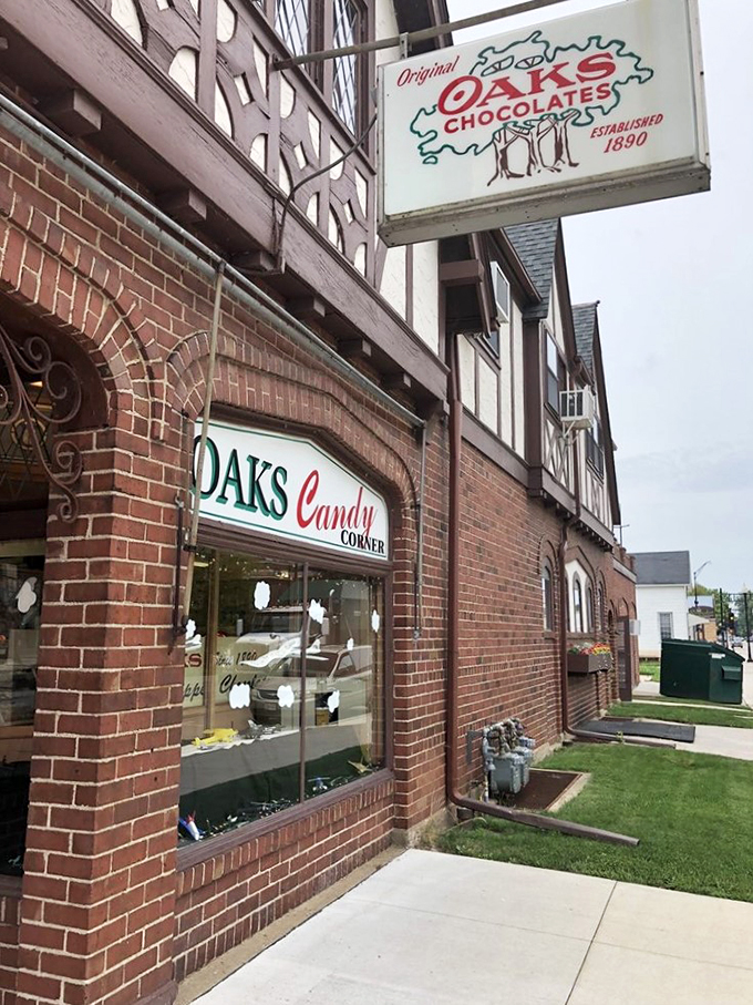 A Tudor-style time machine! Oaks Candy Corner's charming facade promises sweet adventures within. It's like Willy Wonka set up shop in a medieval village.