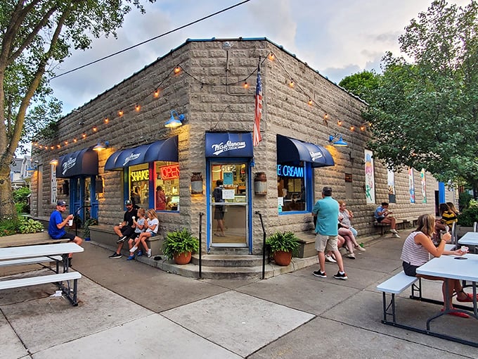 A slice of Americana with a cherry on top! Washtenaw Dairy's charming exterior beckons like a siren song of sweetness, complete with twinkling lights and inviting benches.
