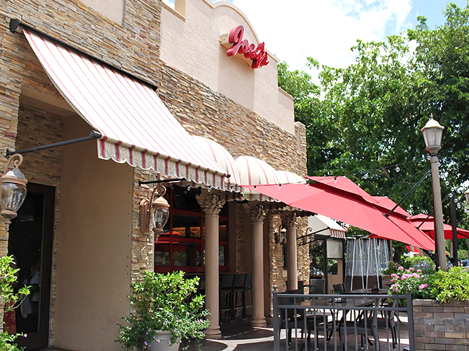Welcome to Joey's, where the exterior is as inviting as a warm Italian hug. This stone facade and red awning combo is practically shouting "Mangia!" at passersby.