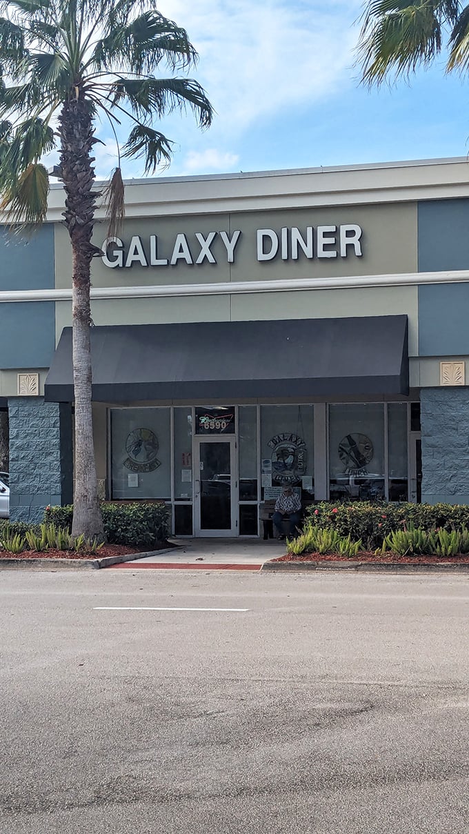 Palm trees and sunshine: Galaxy Diner's exterior promises a cosmic collision of comfort food and coastal charm.