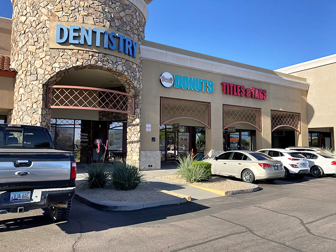 Welcome to donut paradise! Desert Donuts' vibrant storefront promises a sugar-coated adventure that'll make your inner child do backflips.