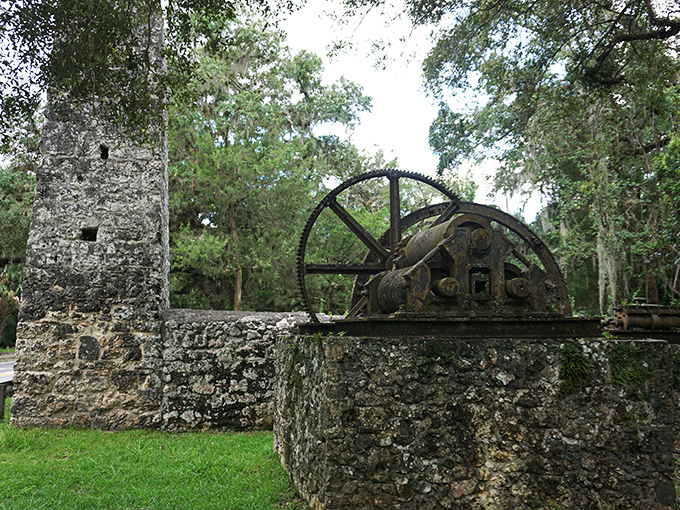 Time-worn stones whisper tales of sweetness past. This rustic ruin, nature's playground now, stands as Florida's own Stonehenge of sugar.