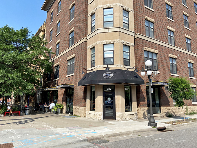 Welcome to butter paradise! The Buttered Tin's exterior promises a world of flaky, golden delights waiting just beyond those glass doors.