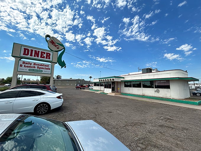 Welcome to Mel's Diner, where the neon sign shines brighter than the Arizona sun! This retro oasis promises a journey back in time with every bite.