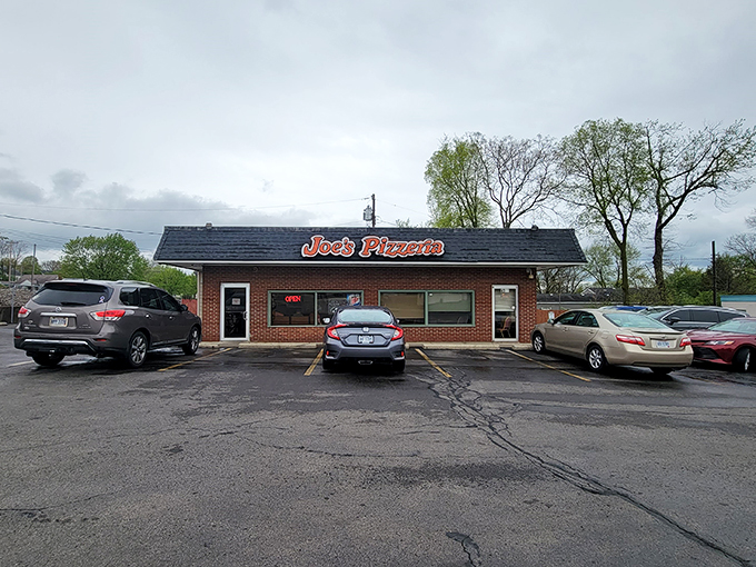 Welcome to pizza paradise! Joe's Pizzeria's retro sign promises a slice of nostalgia and a whole lot of cheesy goodness.