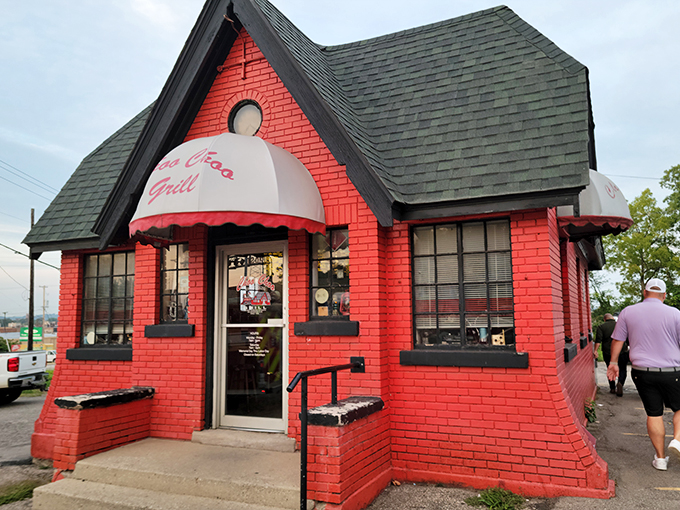 All aboard the flavor express! This cherry-red diner looks like it jumped straight out of a Norman Rockwell painting, promising a journey through time and taste.