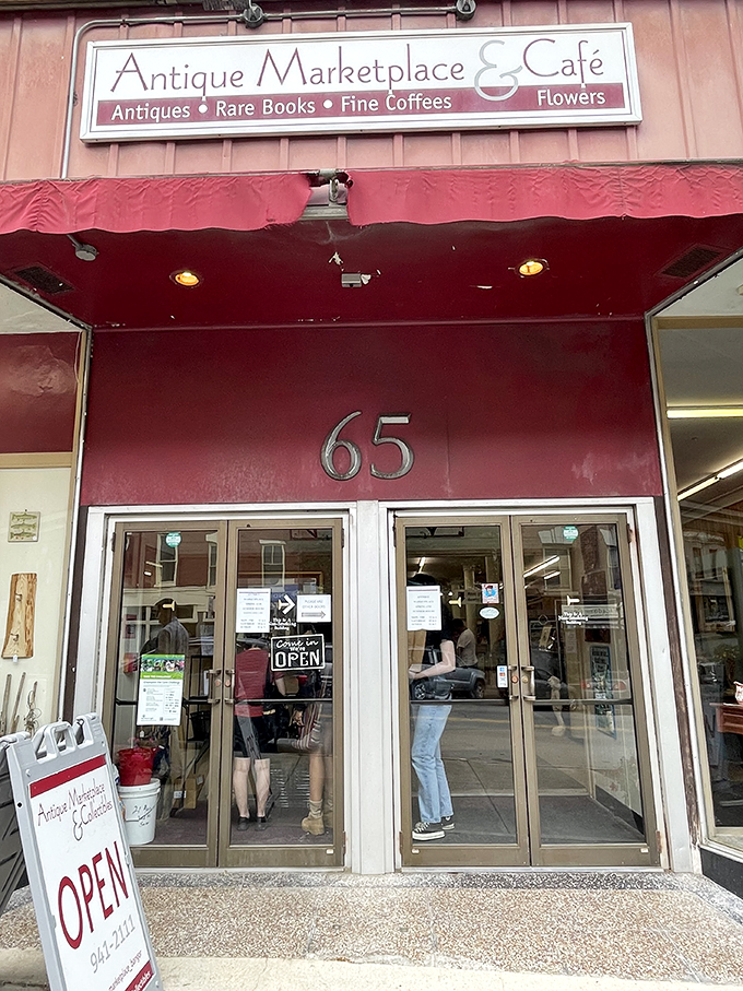 Step right up to the time machine! This burgundy-awninged wonder isn't just a store; it's a portal to the past that'll make you question your smartphone addiction.