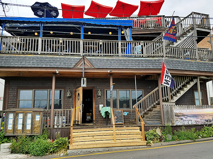 Ahoy, seafood lovers! The Boathouse Bistro stands tall, a beacon of culinary delight in Boothbay Harbor. Those umbrellas aren't just for show &ndash; they're inviting you to a feast with a view!