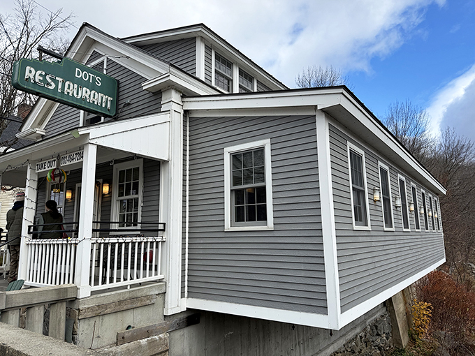 Welcome to Dot's, where nostalgia blooms alongside the flowers! This charming exterior promises a feast for both your eyes and your taste buds.