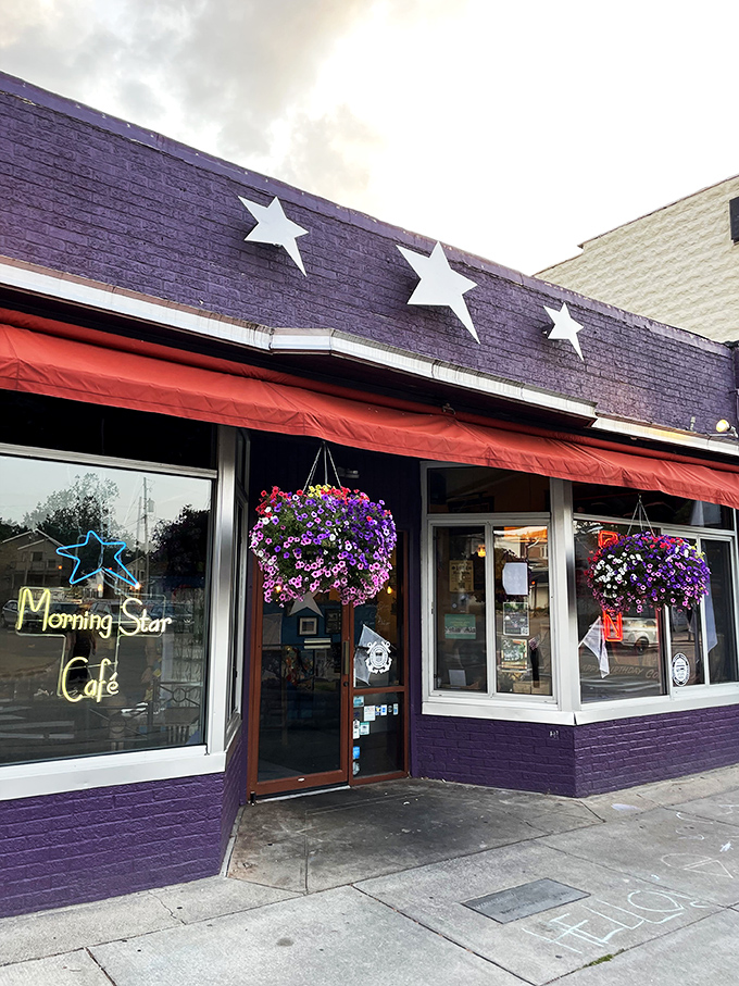 Purple reign! This vibrant exterior isn't just eye-catching; it's a siren call to hungry souls seeking breakfast nirvana.