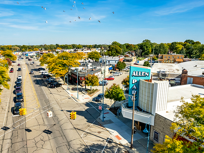 Welcome to Allen Park, where small-town charm meets big-city convenience! This aerial view showcases the vibrant downtown, bustling with life and lined with trees that could make Central Park jealous.