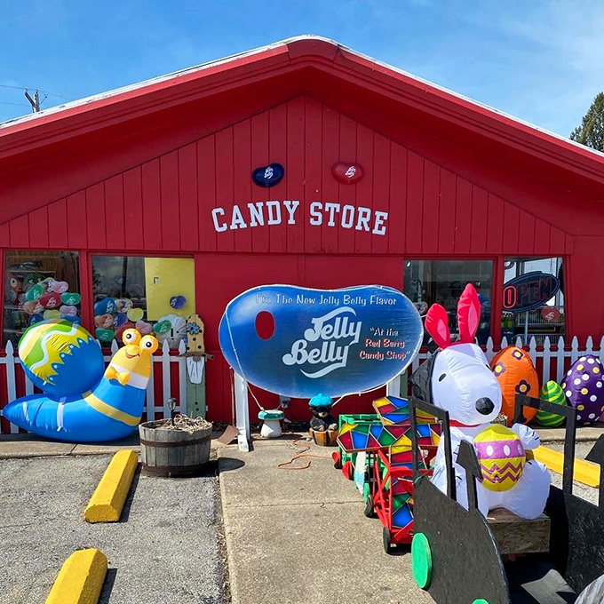 A candy-coated dream come true! This vibrant red building isn't just a shop; it's a portal to childhood joy, complete with a picket fence to hold back the sweetness.