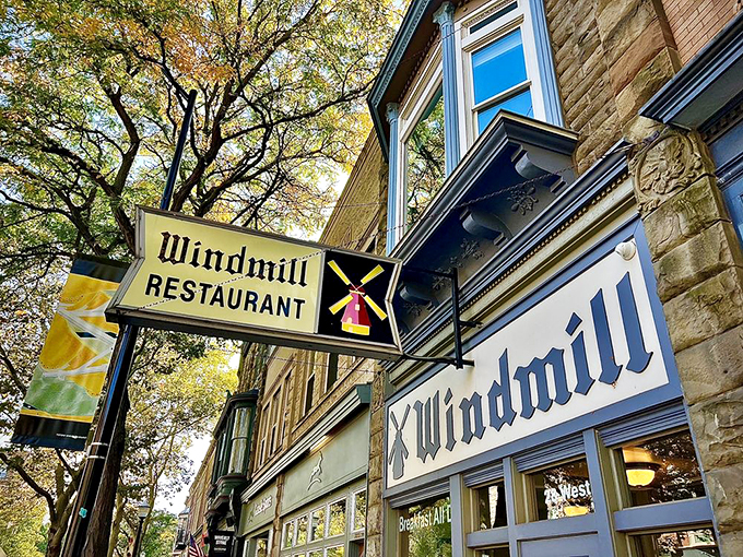 A slice of Americana with a Dutch twist! The Windmill Restaurant's charming exterior promises comfort food and cozy vibes inside.