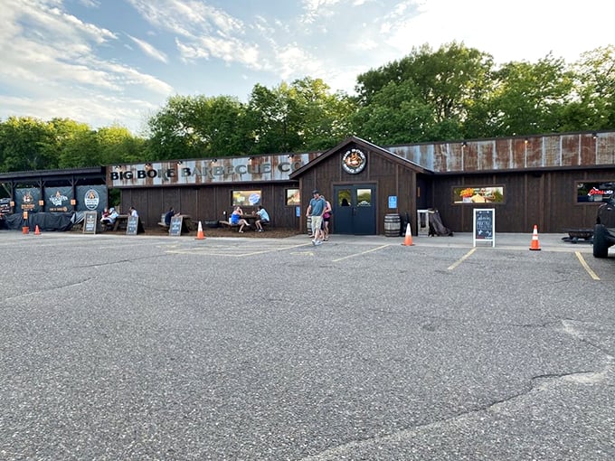 Welcome to BBQ paradise! Big Bore Barbecue's rustic exterior promises smoky delights within, like a carnivore's Narnia hiding behind an unassuming wardrobe.