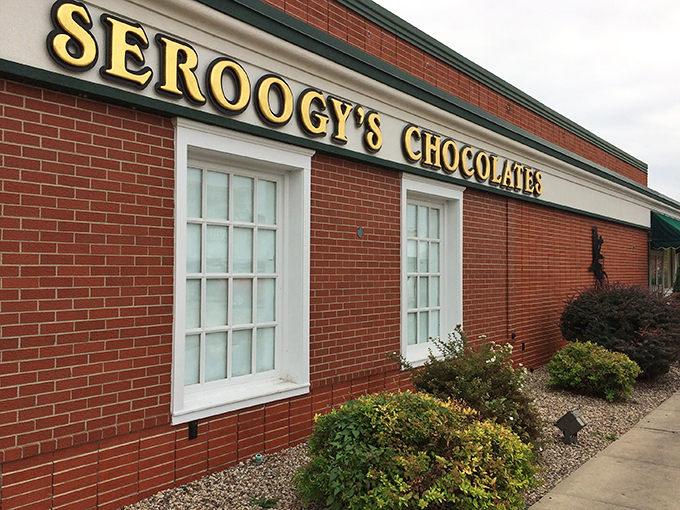 Chocolate heaven has an address! Seroogy's brick facade promises sweet treasures within, like a Willy Wonka factory for grown-ups.