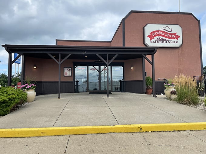 Welcome to barbecue paradise! Hickory River Smokehouse's unassuming exterior hides a world of smoky delights within. It's like finding a treasure chest disguised as a garden shed.