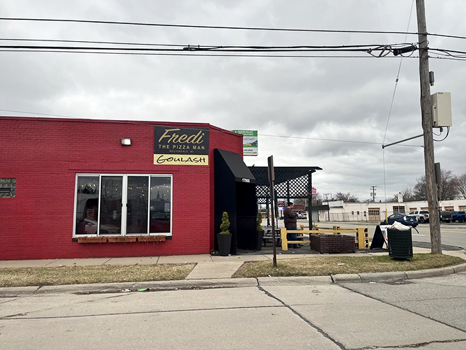 A beacon of pizza perfection! Fredi The PizzaMan's vibrant red exterior is like a siren call to hungry souls, promising New York-style slices in the heart of Michigan.