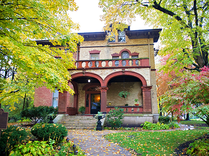 A grand entrance fit for a Victorian novel! This yellow brick beauty stands tall, inviting you to step back in time and indulge in some 19th-century glamour.
