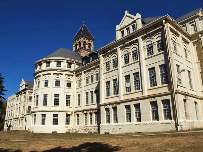 "Grandeur with a side of goosebumps!" This imposing facade could be the lovechild of Hogwarts and the Overlook Hotel. Talk about curb appeal!