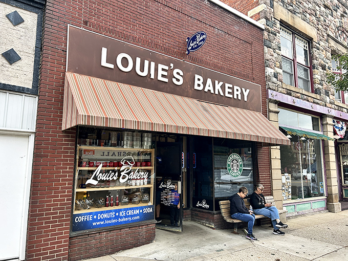 Step into a time machine disguised as a bakery! Louie's charming exterior promises sweet adventures and sugary delights within.